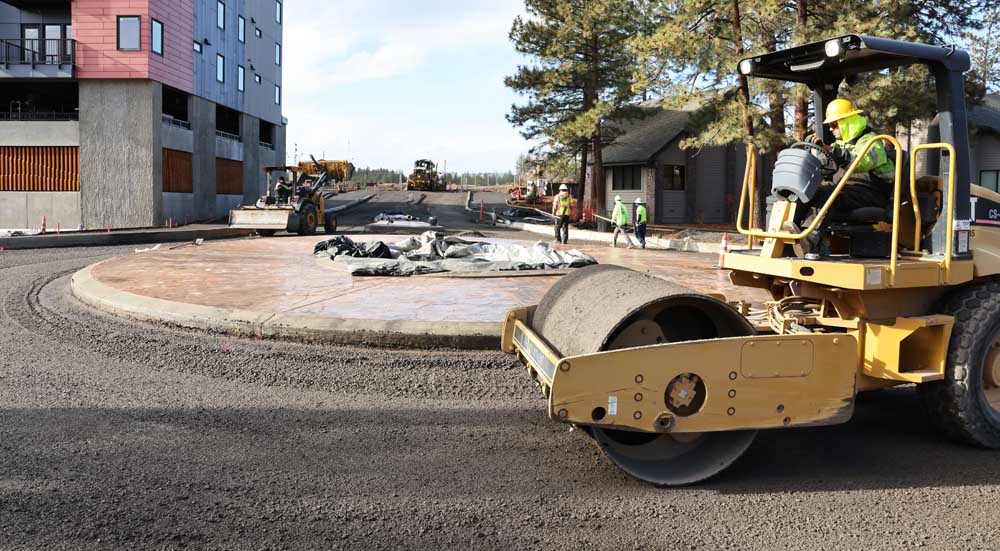 Century Drive road closure extended while weather delays ‘mini ...