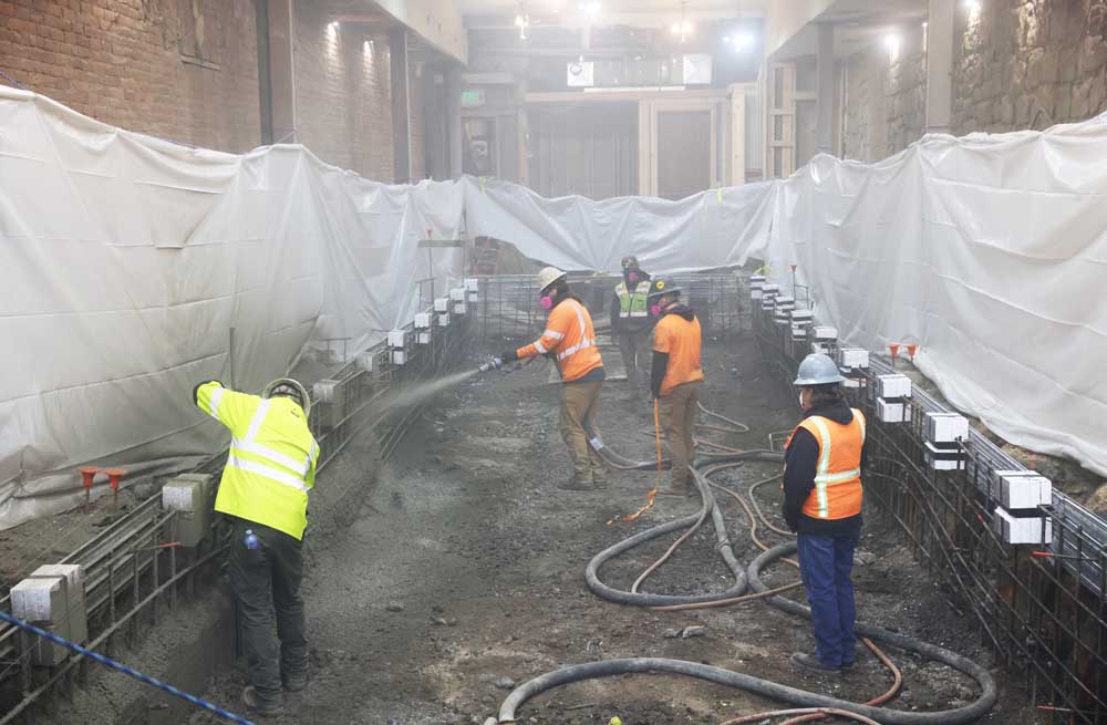 Excavation underway to build basement under historic Bend building ...